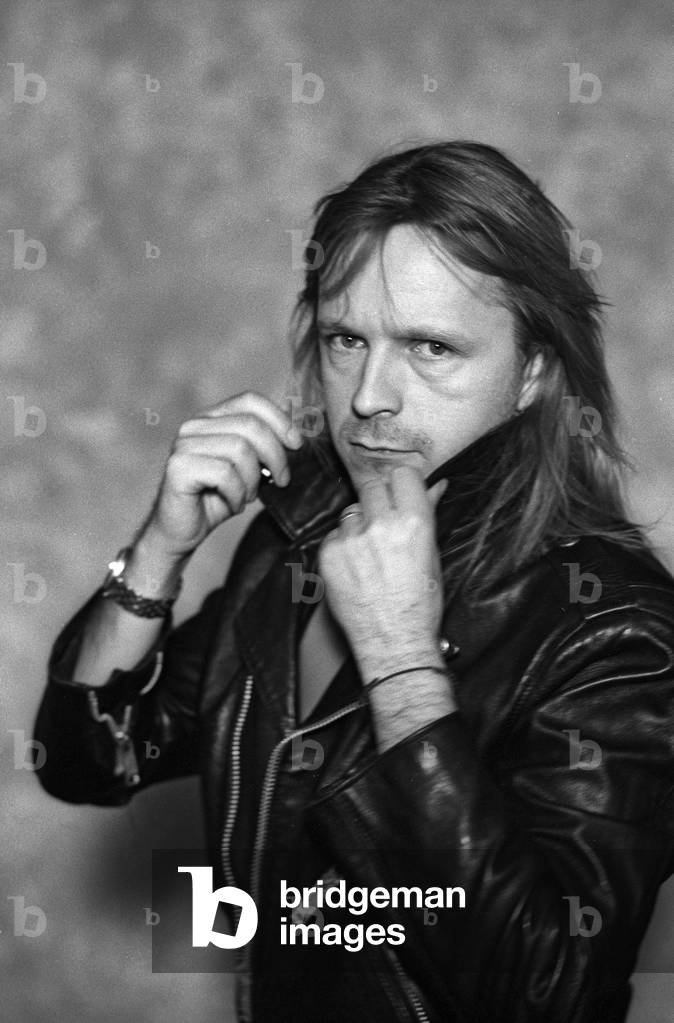 Image of French singer Renaud (Renaud Sechan) posing for "Marchand de ...