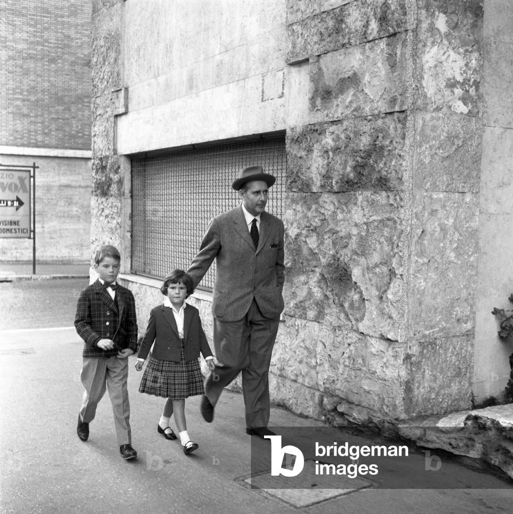 Image of Roberto Rossellini with his children, Italy, 1957 (b/w photo)