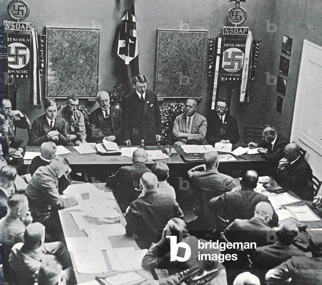 Image of Hitler in Munich adressing a meeting of the NSDAP in