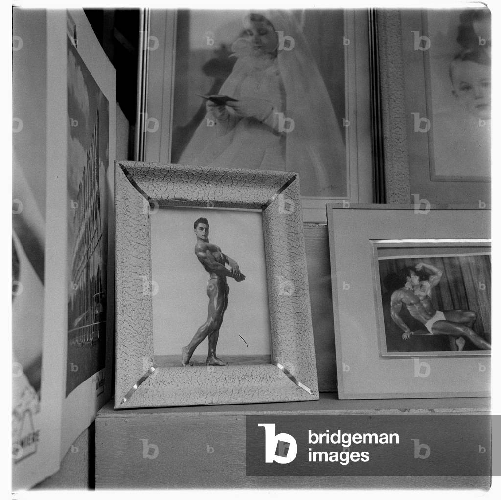Image of Image of a photographers window showing beefcake muscle posing ...