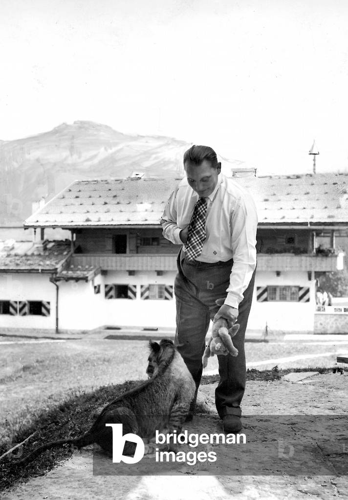 Image of Goering with lion. 1934 (b/w photo)