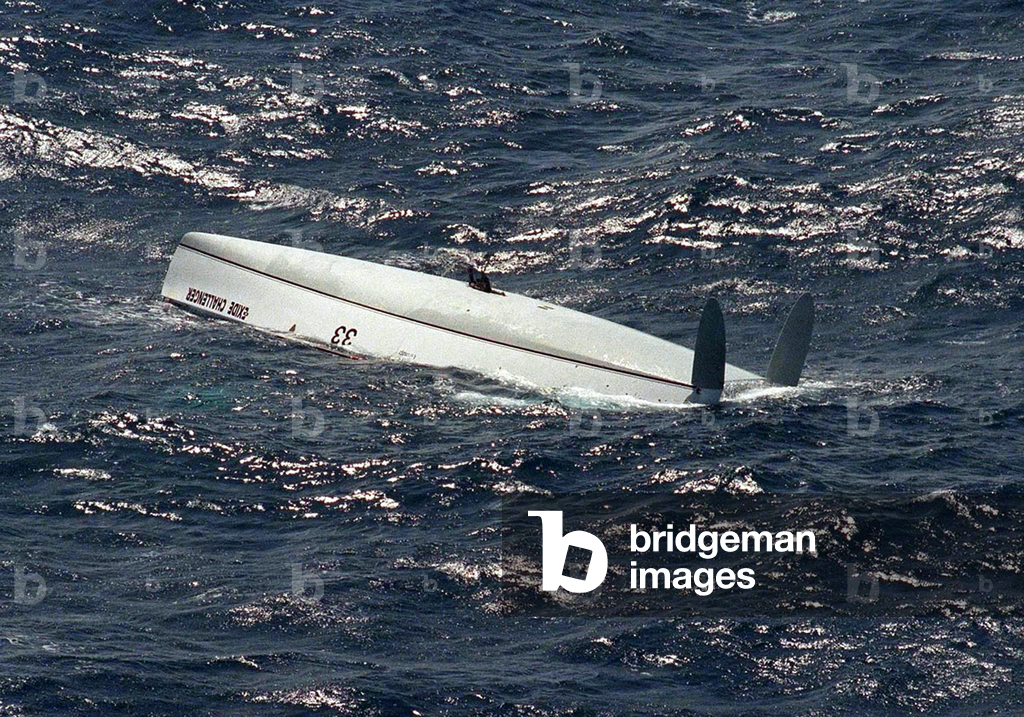 Image of The capsized yacht Globe Exide Challenger of British solo ...