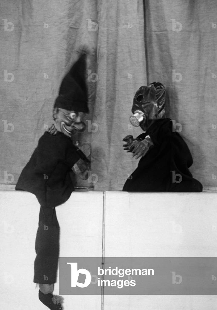 Image of Hand puppet show with gas mask, 1933 (b/w photo)