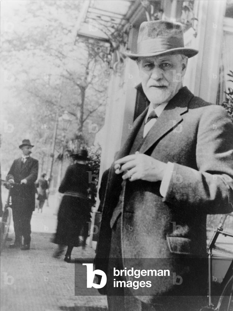 Image of Sigmund Freud (1856-1939), standing on sidewalk outside The ...