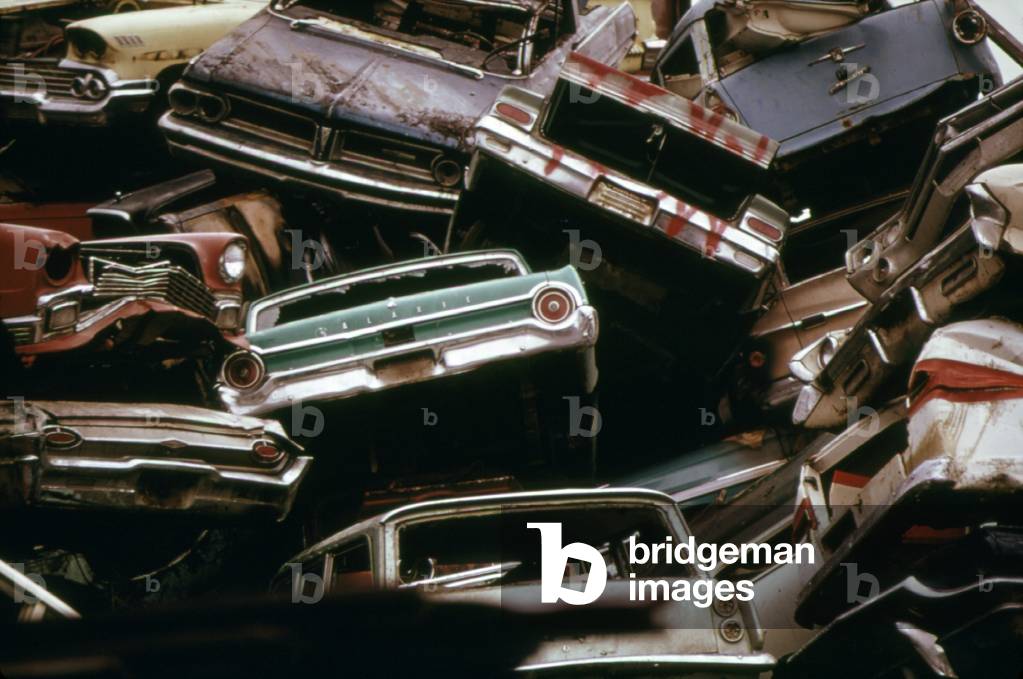 Image of American cars crushed for scrap steel to be recycled in