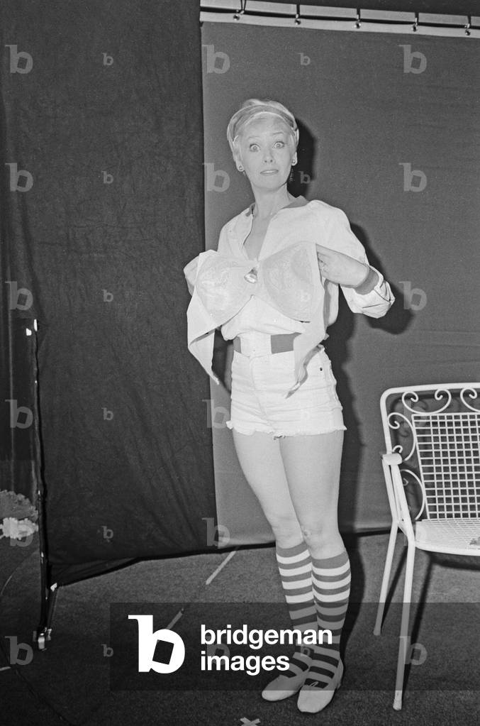 Image of German TV presenter Hanni Vanhaiden with a oversize bra at