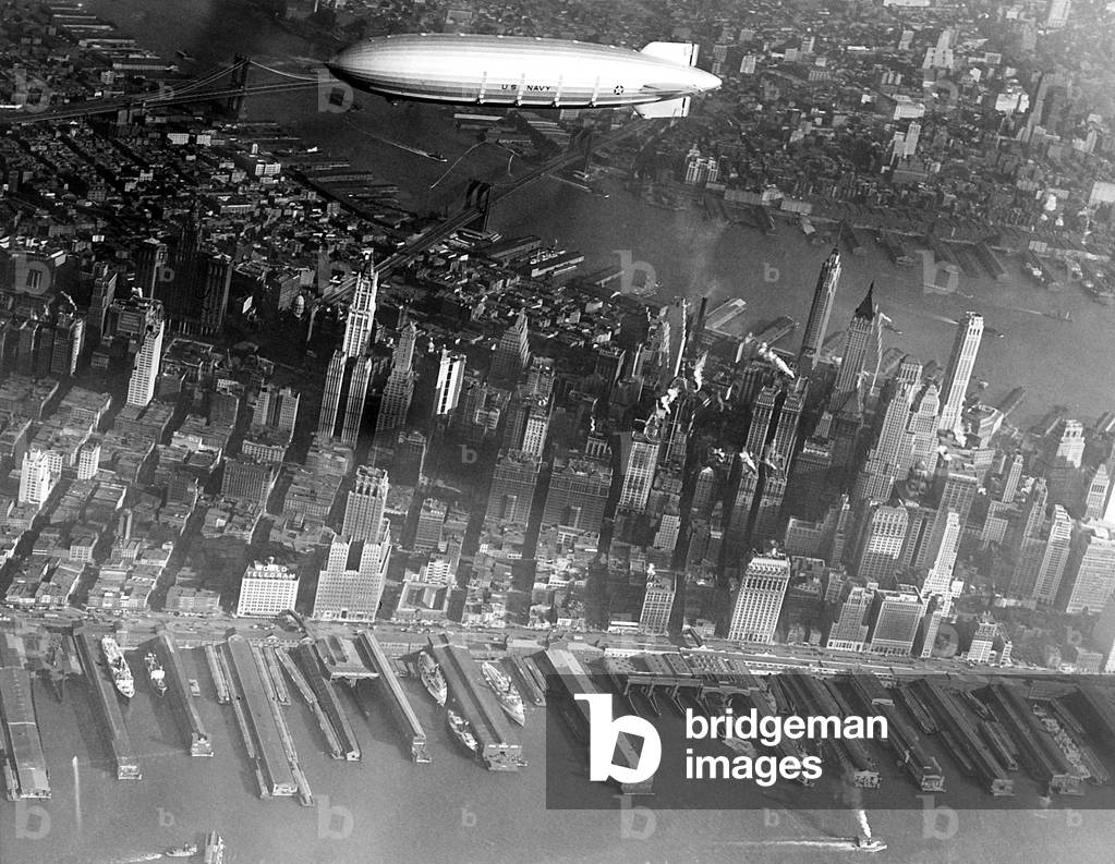 Image of New York City, aerial view of the U.S.S. Akron dirigible,