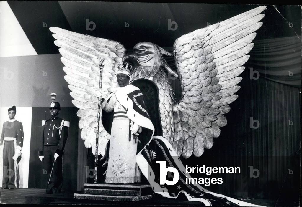 Emperor Bokassa, standing before his golden-eagle throne in Bangui's ...