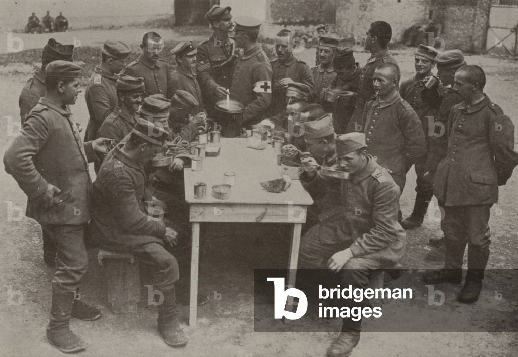 Image of Captured German prisoners of war being given food and drink ...