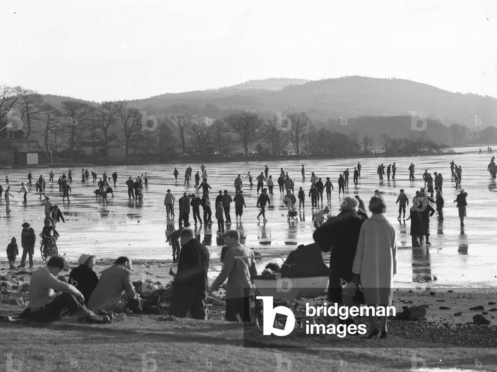 Image of A view of children and adults skating on a frozen by Hardman ...