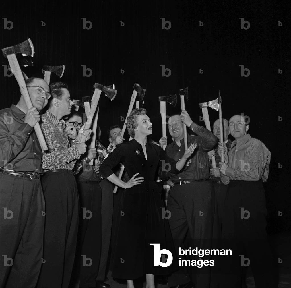 Image of French singer, actress and revue leader Line Renaud attending the