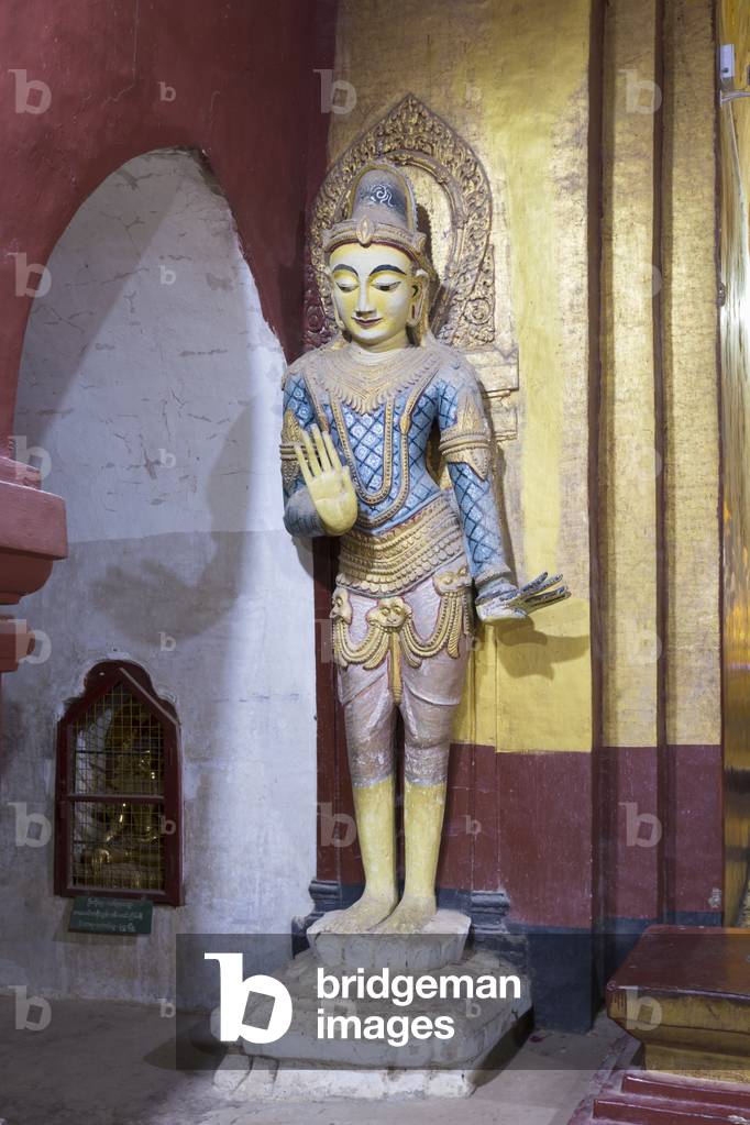 Image of Door guardian, made of carved and painted hard wood, flanking