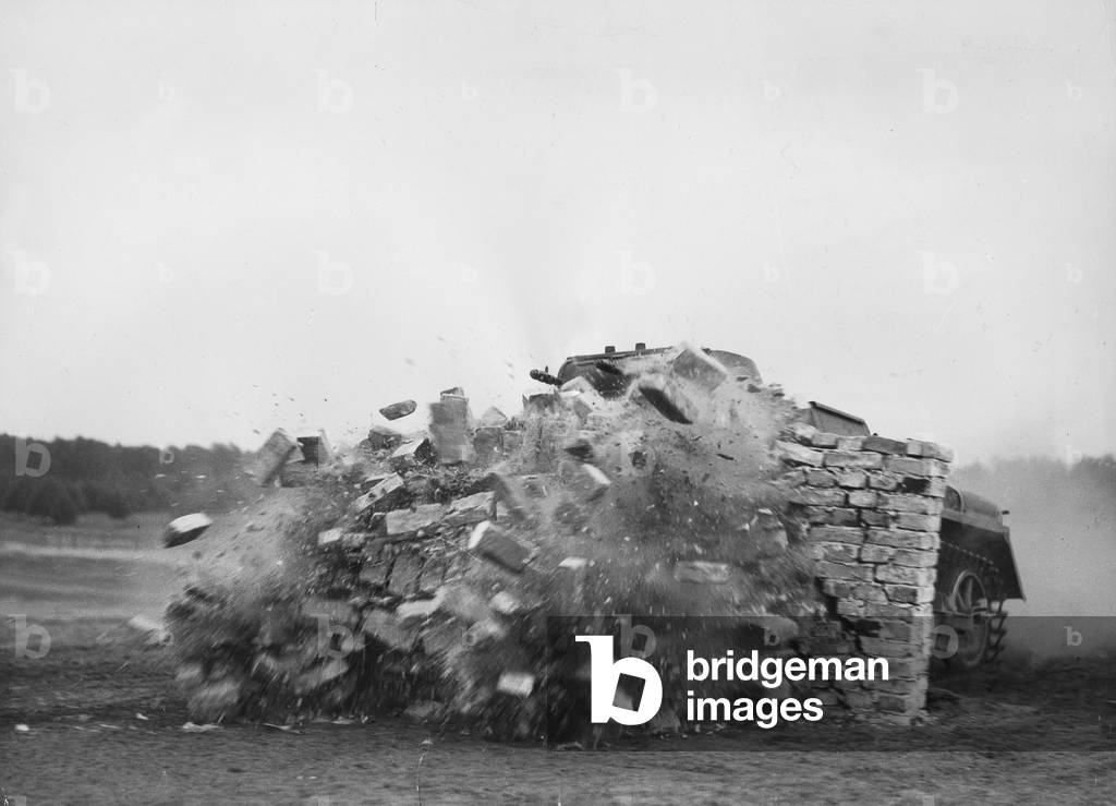 Image of Panzer I breaks through a brick wall, 1936 (b/w photo)