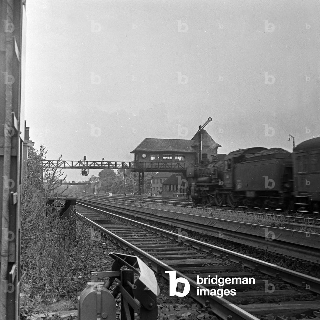 Image of Railway with gantry style signal tower of the Deutsche Bundesbahn,