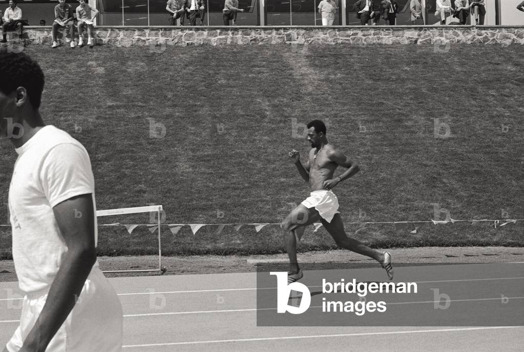 Image of The sprinter John Carlos is training at the Olympic Games