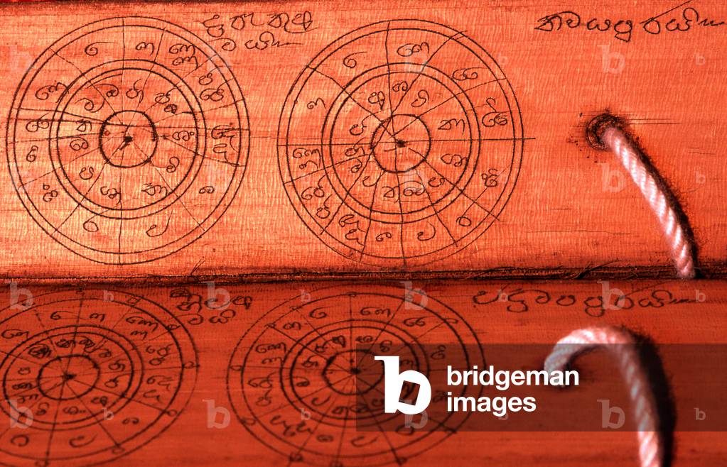 Image of Sri Lanka: Palm-leaf manuscript with religious scripts ...