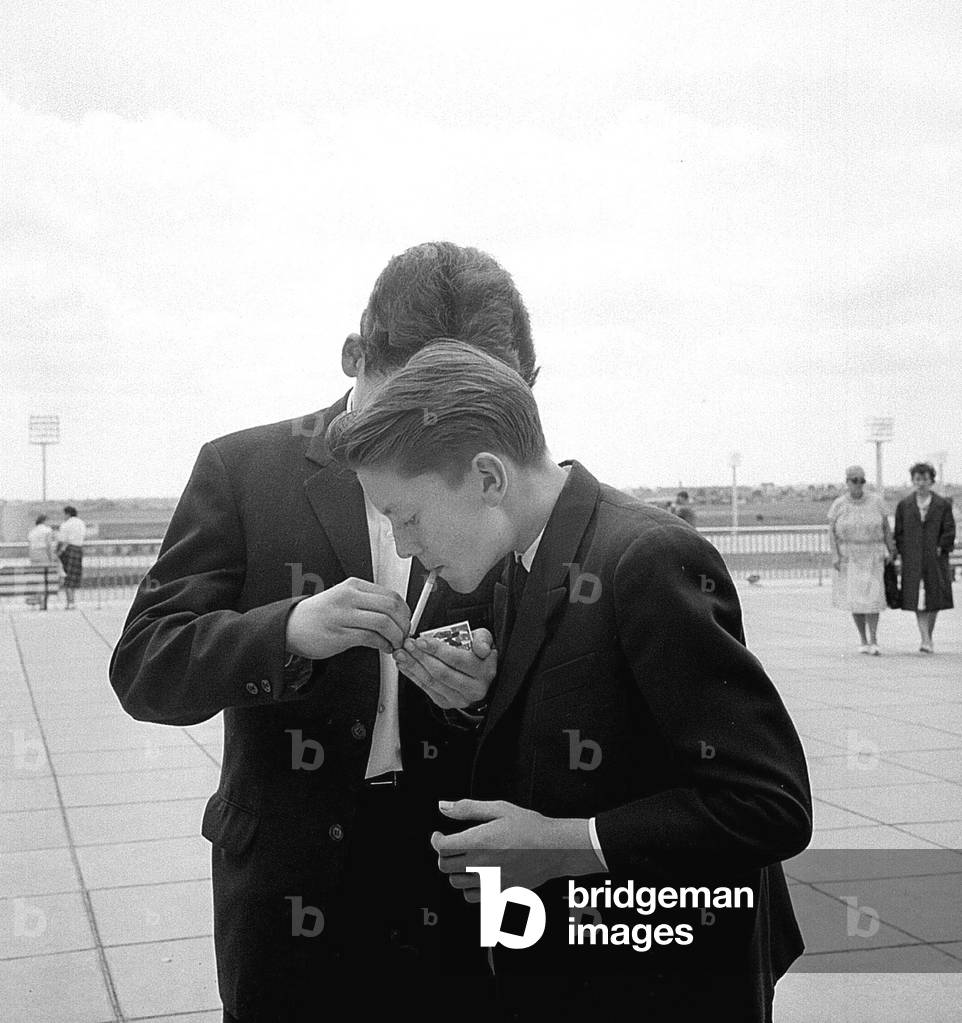 Image of The first cigarette, 1954 (b/w photo) by Bloncourt, Gerald
