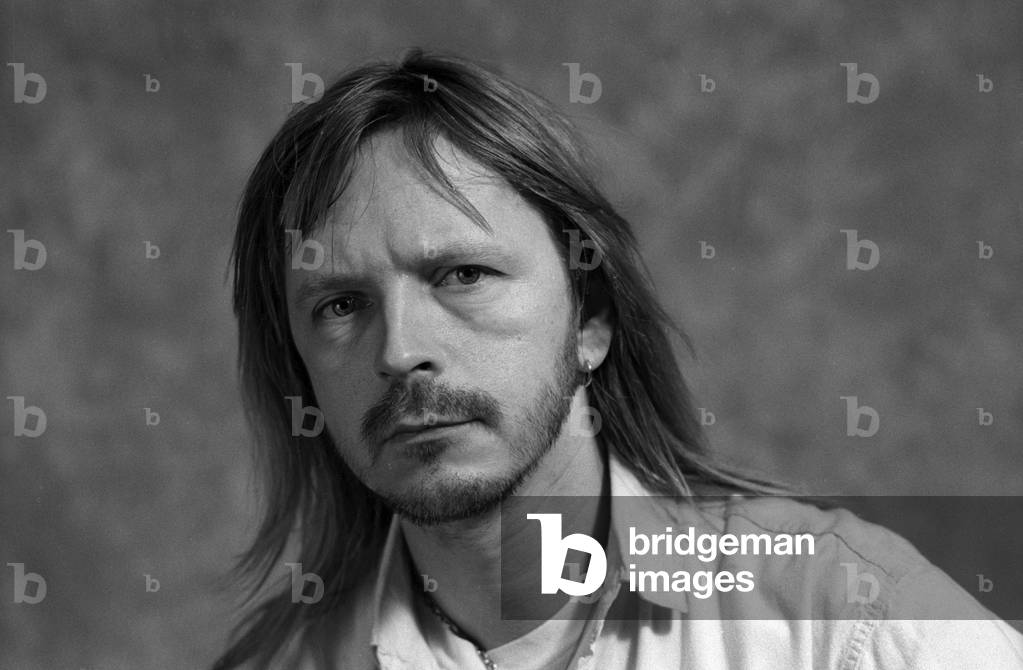 Image of French singer Renaud (Renaud Sechan) posing for "Marchand de ...