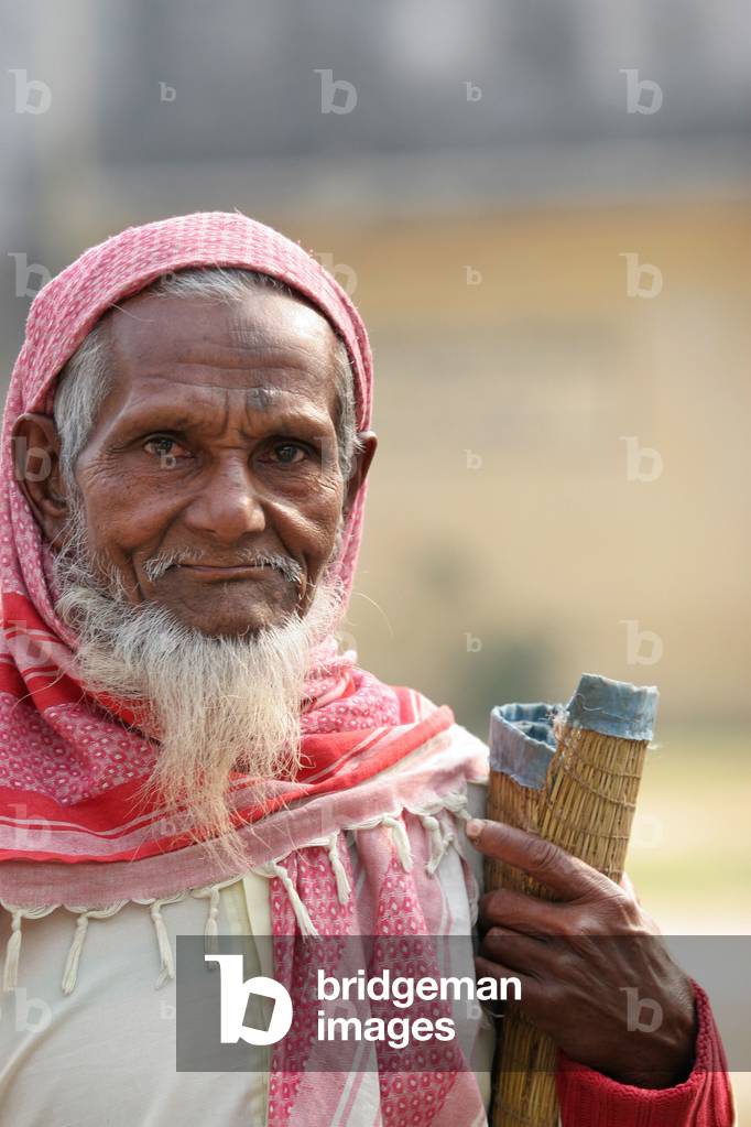 Image of Portrait of an old Muslim, on his way to attend