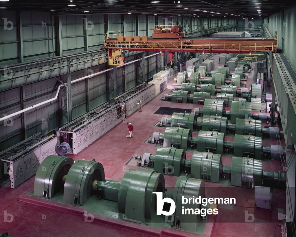 High angle view of a motor and turbine room in a hot rolling steel mill by