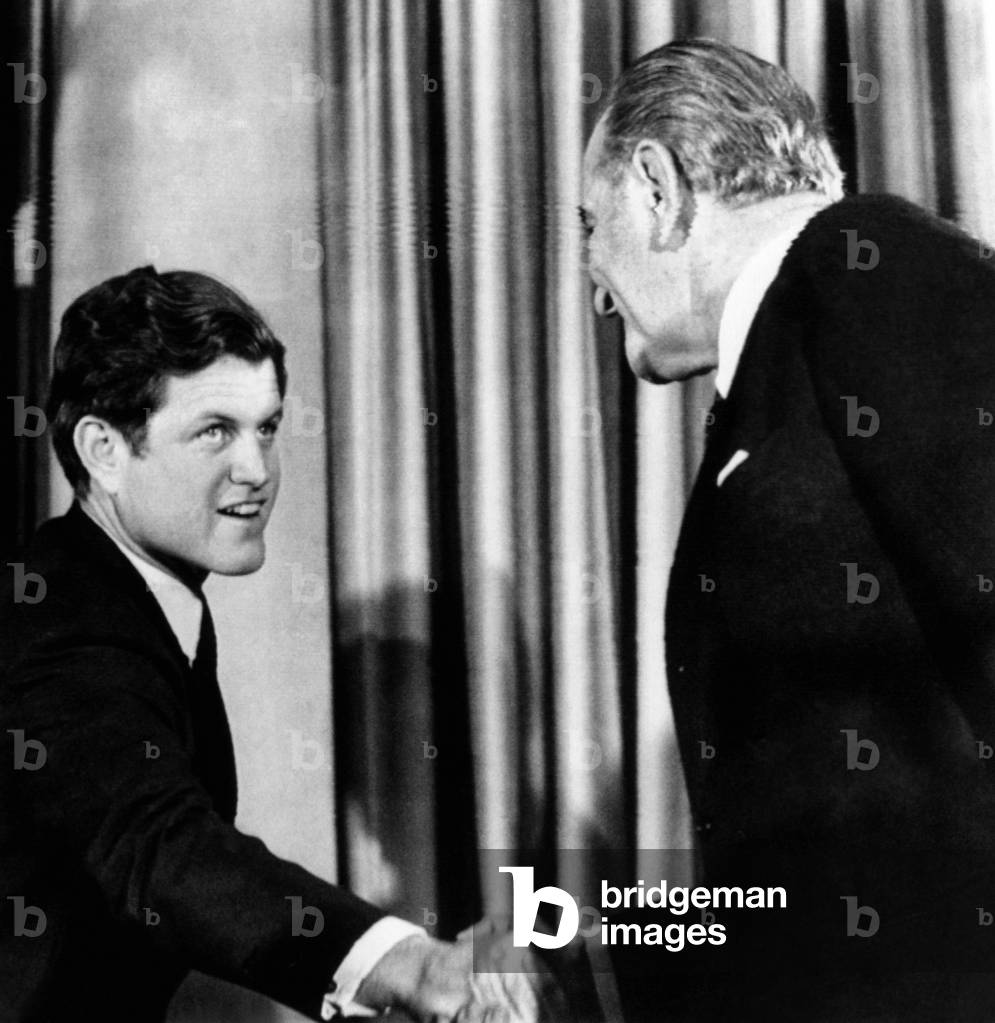 Image of President Lyndon Johnson shakes the hand of Senator Edward ...