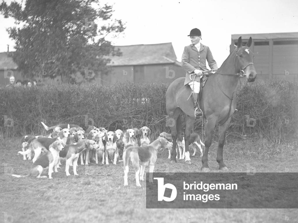 Image of A view of a huntsman on horse back standing with by Hardman ...