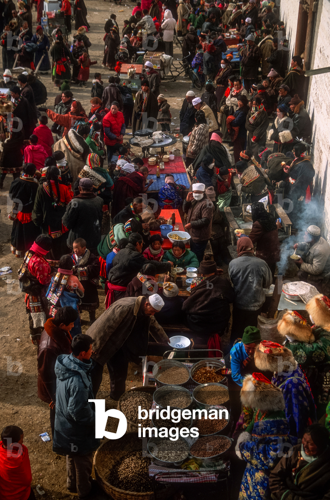 Image of Ouside the monastery, many food stands sell sunflower seed ...