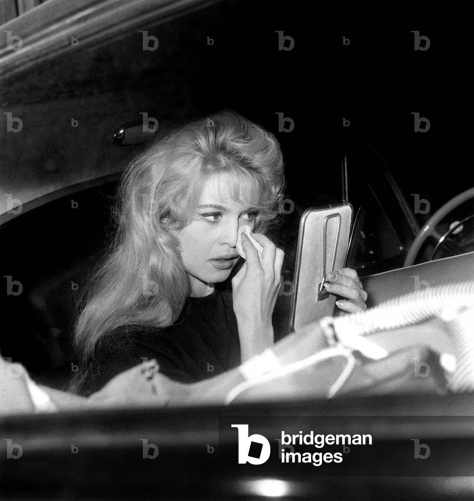 Image of Brigitte Bardot Putting Some Make-Up on Set of Film in