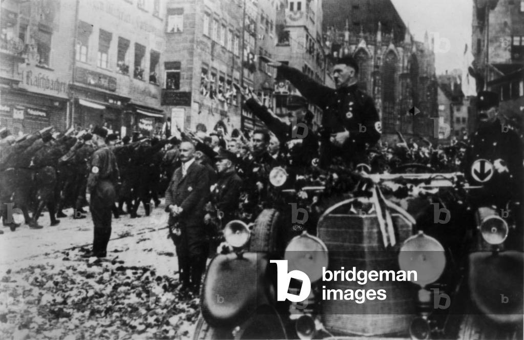 Image of Hitler Saluting His Soldiers From a Car, 1942 (b/w photo)