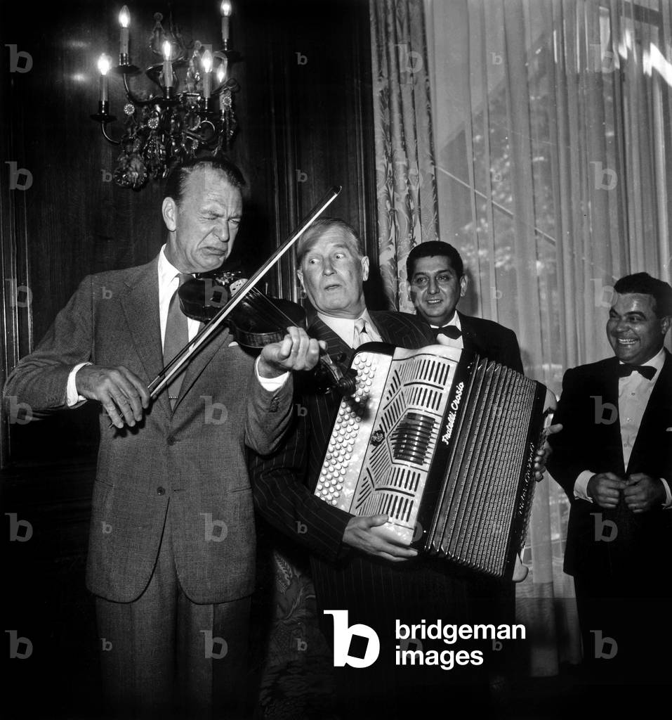 Image of Gary Cooper Playing Violin and Maurice Chevalier Accordion For ...