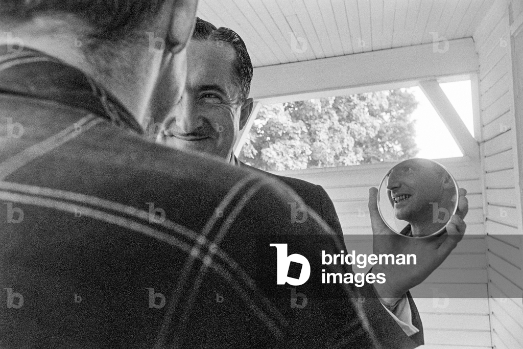 Image of Dr. MacLean show patient image of self in a mirror. by Spiegel ...