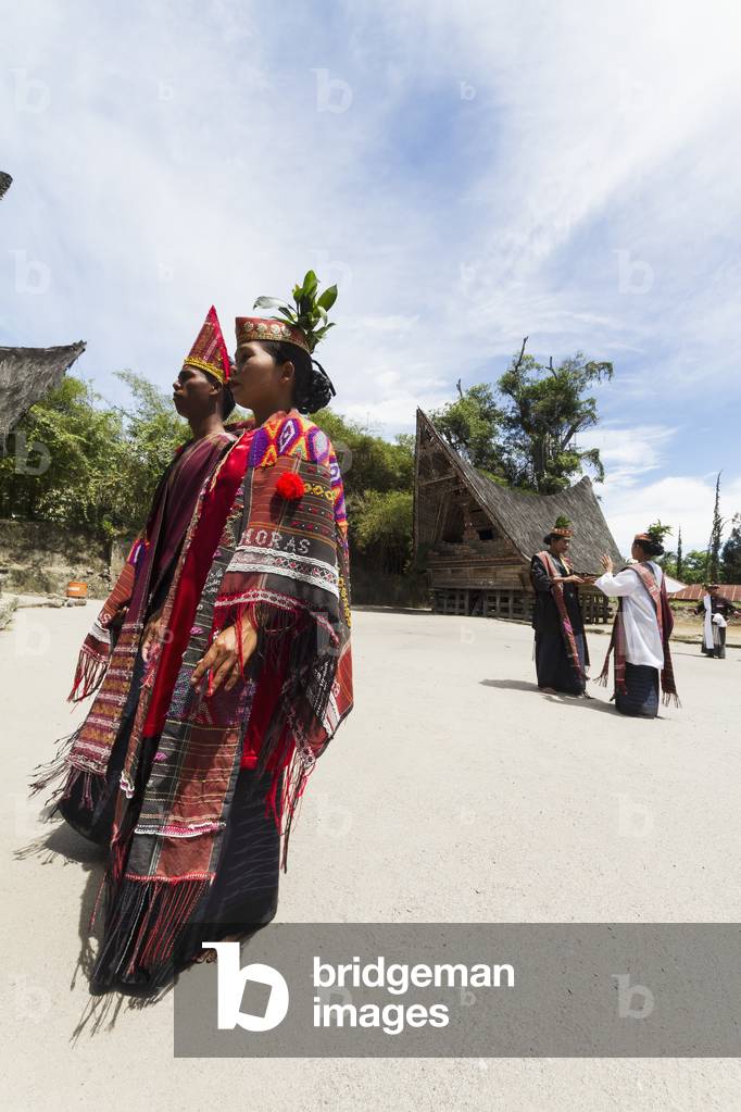 Image of Toba Batak people performing a traditional Batak dance at Huta