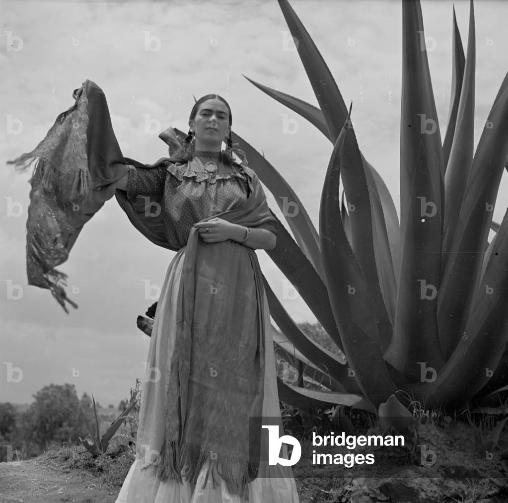 Image of Frida Kahlo (Senora Diego Rivera) standing next to an agave by ...