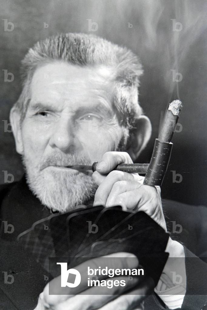Image of A man smoking a cigar for an advertising campaign, Germany