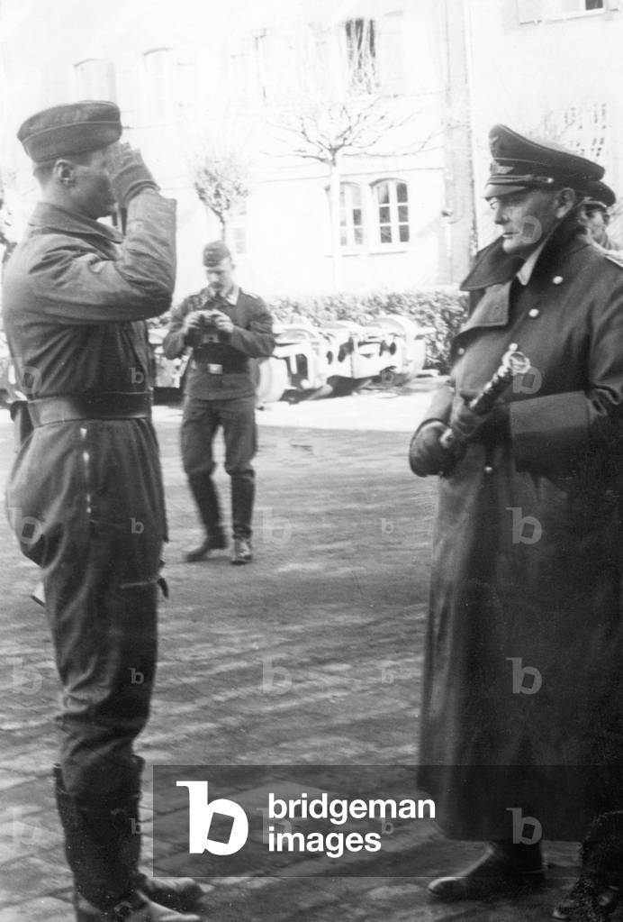 Image of Hermann Goering in a military airfield, 1940 (b/w photo)