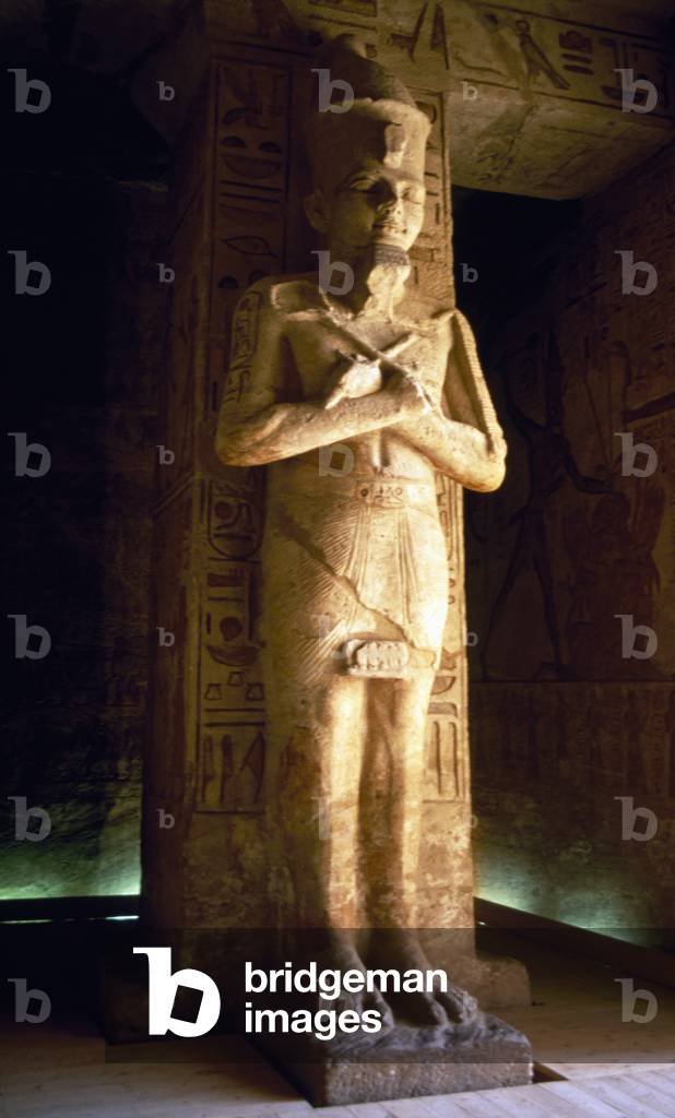 Image of Pillar and colossal statue of Ramses II depicted as god by Egyptian 19th Dynasty (c ...
