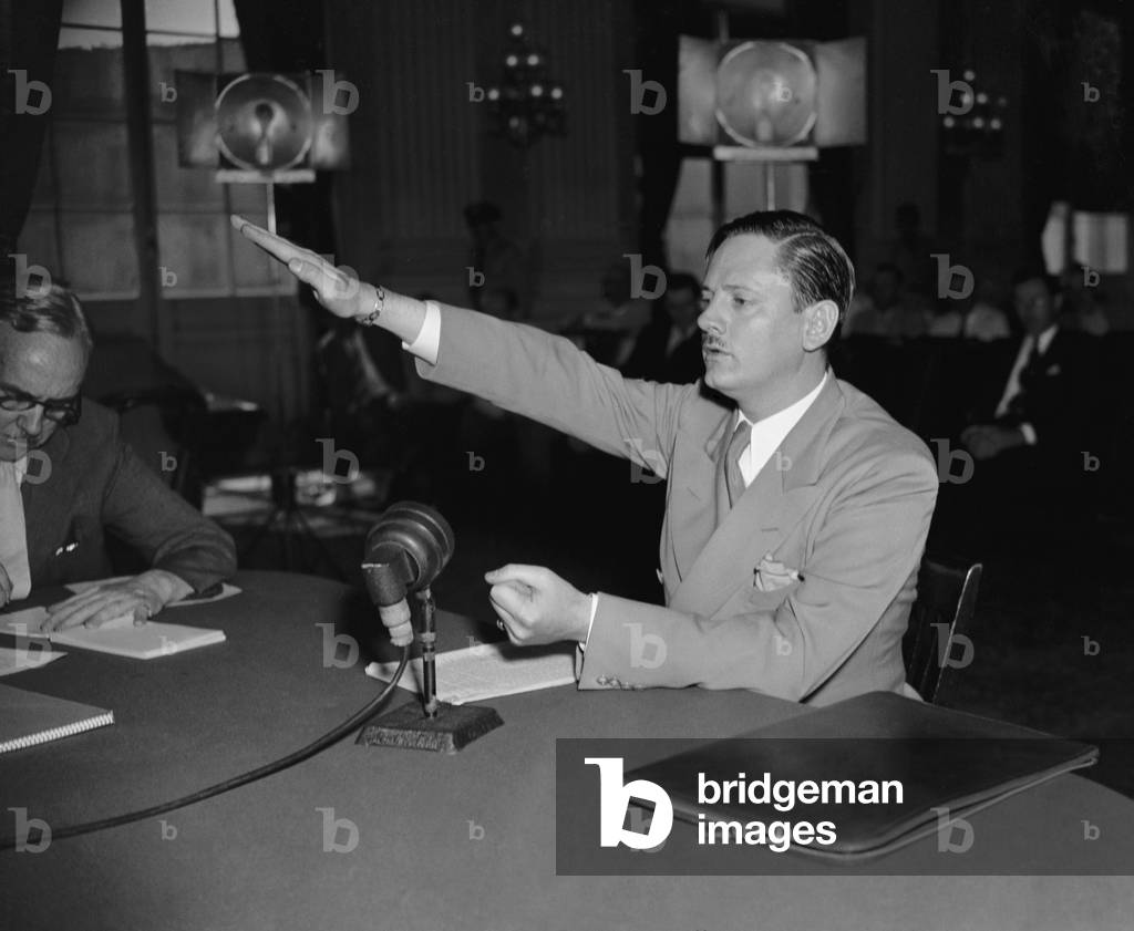 Image of John Metcalfe, testifies about the American Nazi party. Giving the