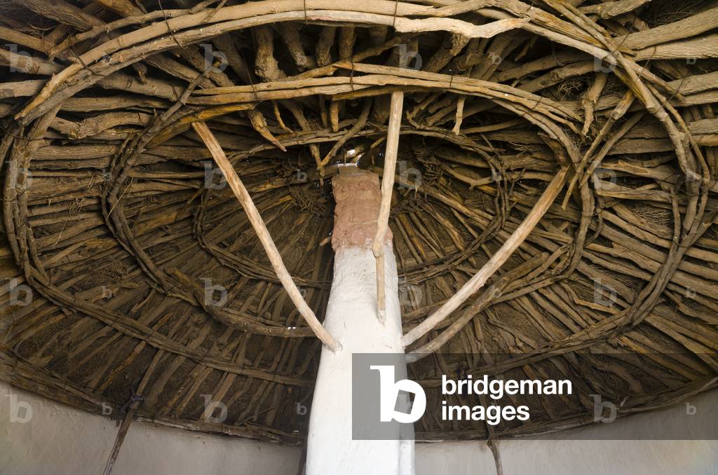 Image of Interior roof timber supports and central column in circular ...