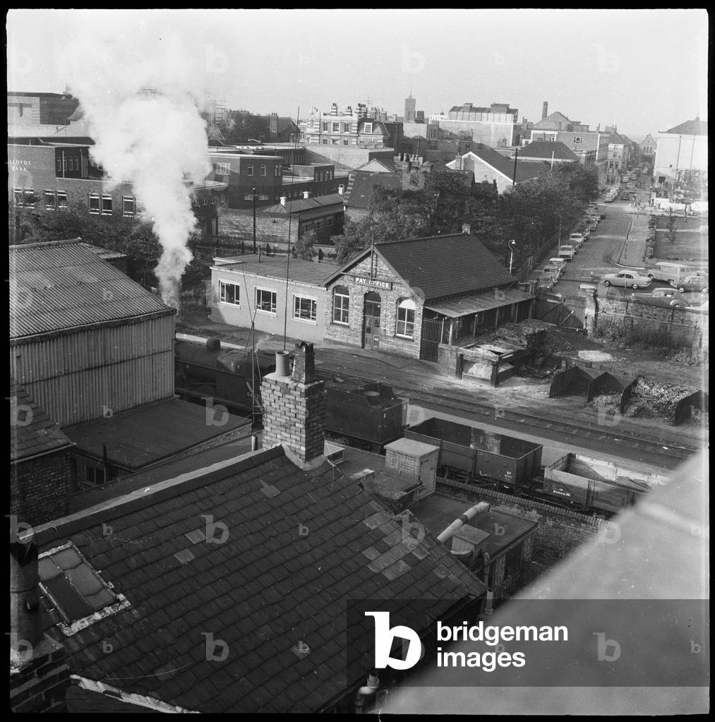 Image of An elevated view looking down onto railway tracks and Pay