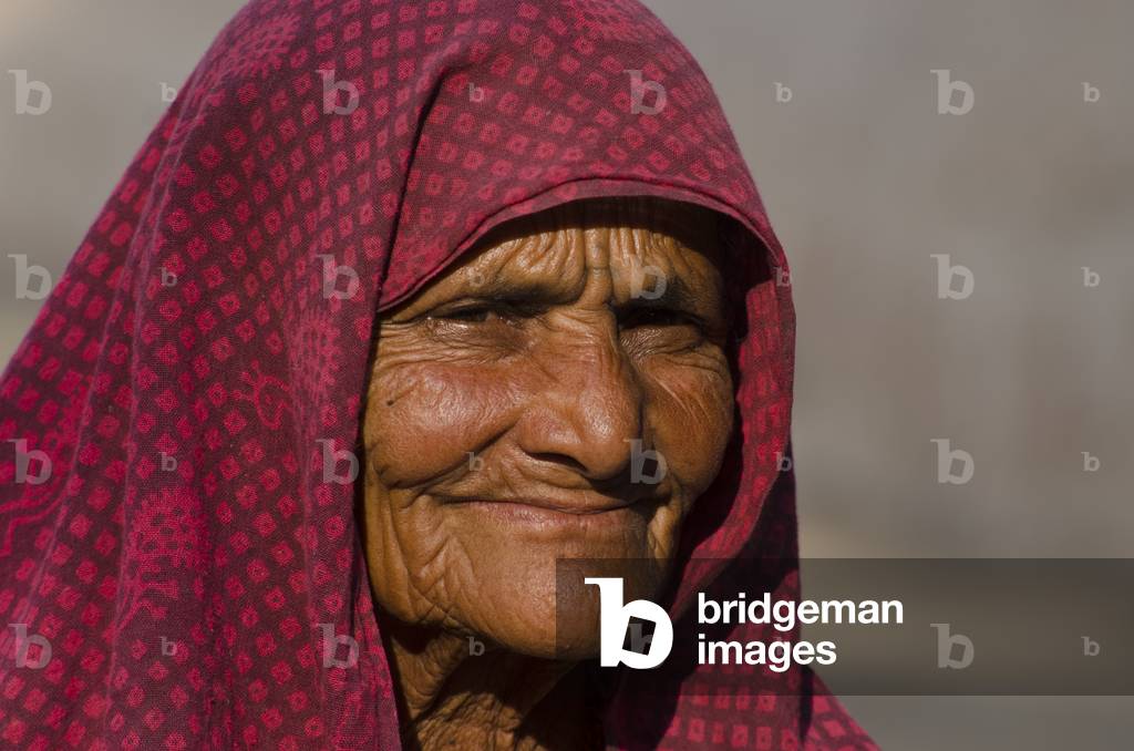 Image of Portrait of 78-year old Rajasthani woman wearing headscarf ...