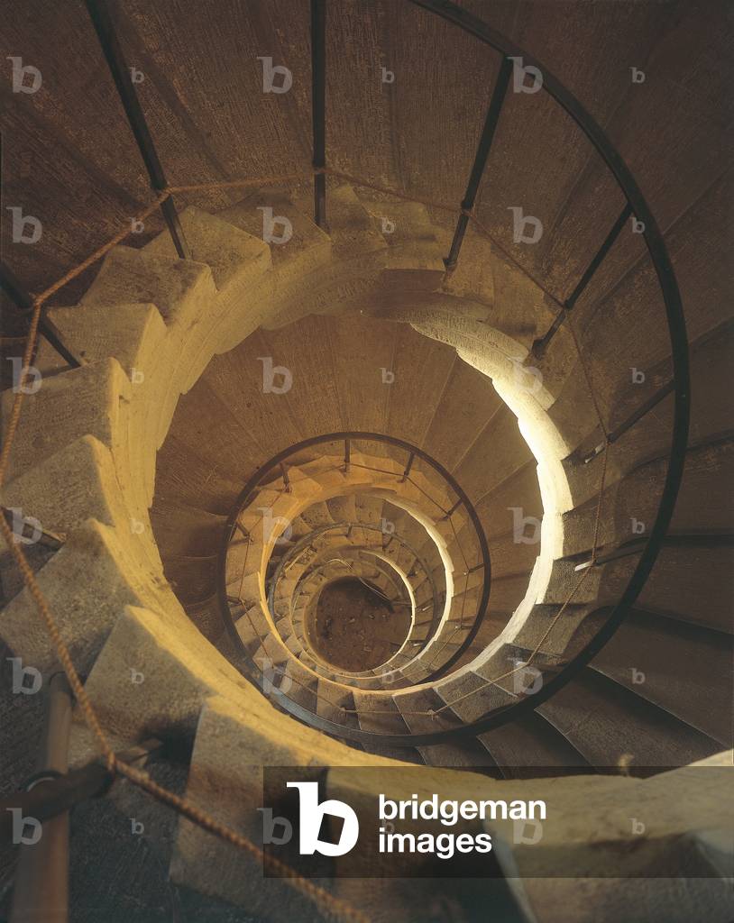 Image of High angle view of a spiral staircase in a palace,