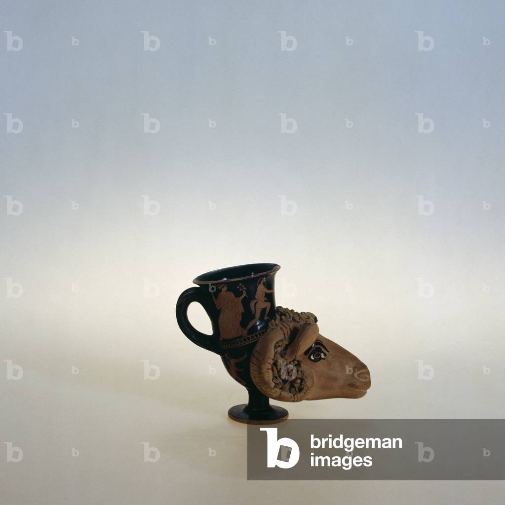 Image of Ram head shaped rhyton with dancing maenads and satyrs, red-figure