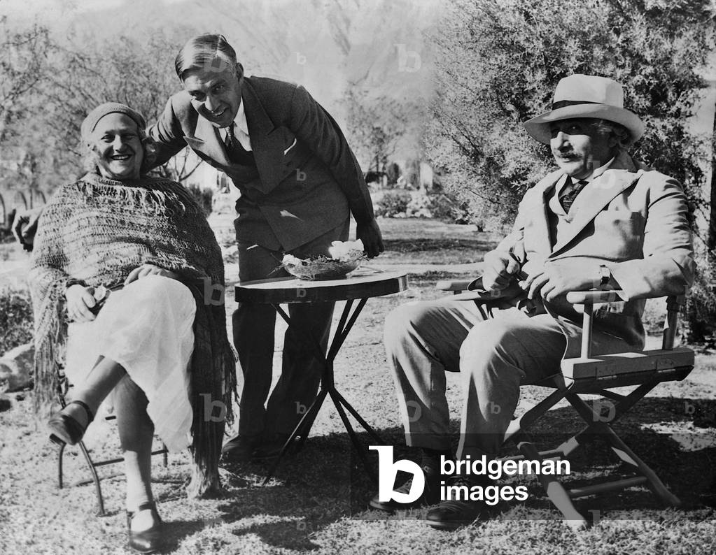 Image of Albert Einstein and his wife Elsa in the garden during