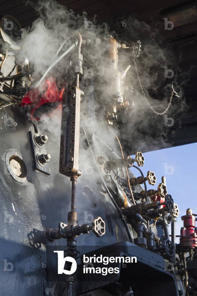 Image of Steam pipes and valves in the cab of the Baldwin