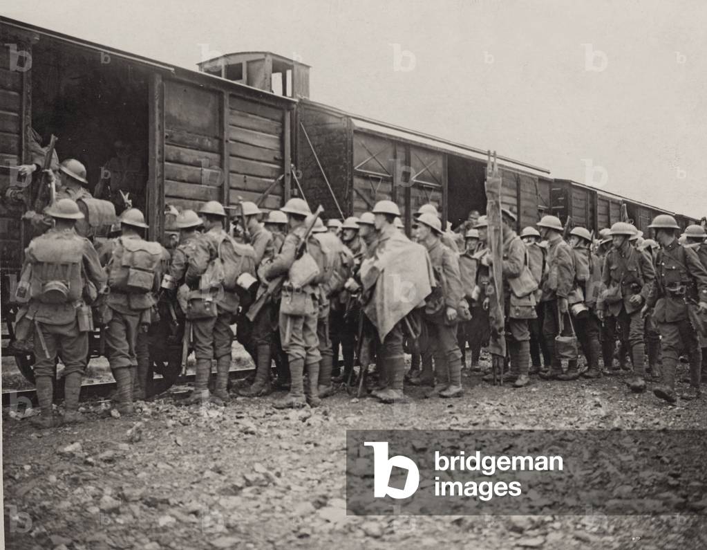 Image of Men of a Midland Regiment boarding a train after fighting