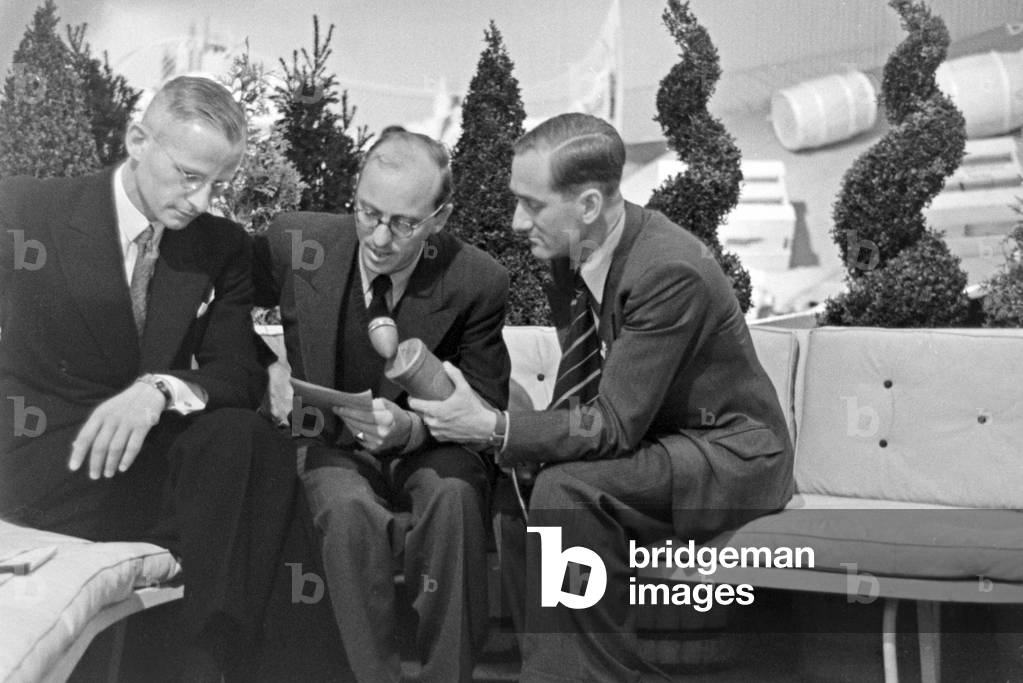 Image of Radio reporter interviewing at the Leipzig trade show, Germany ...