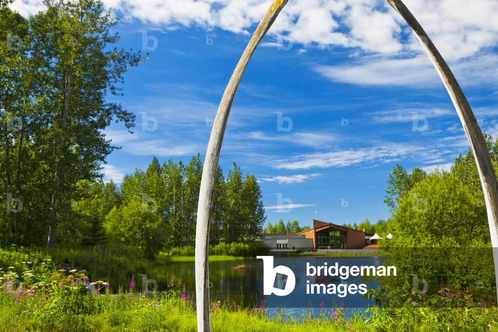 Image of Alaska Native Heritage Center building and Lake Tiulana viewed ...