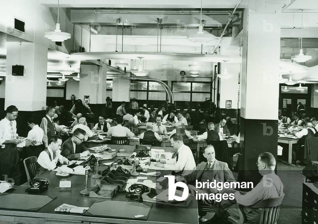 Image of Sub-editors in a newspaper news room. Circa 1945.