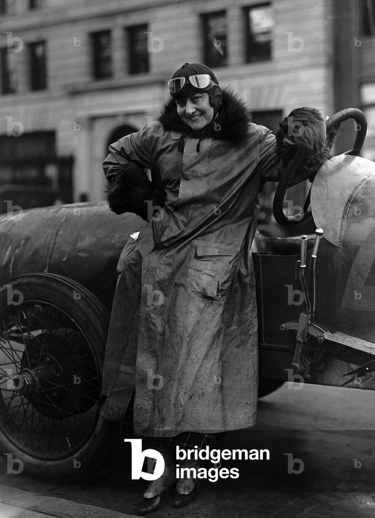 Image of Woman with race car c. 1920s