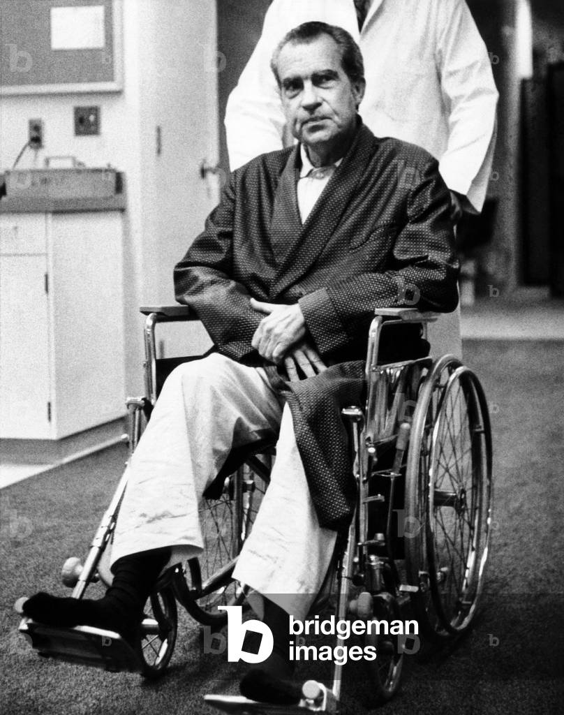 Image of Former President Richard Nixon in wheelchair. He was at Long